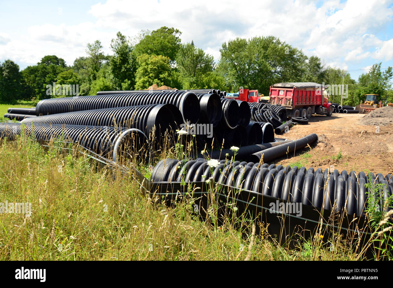 Construction pipes on site Stock Photo - Alamy