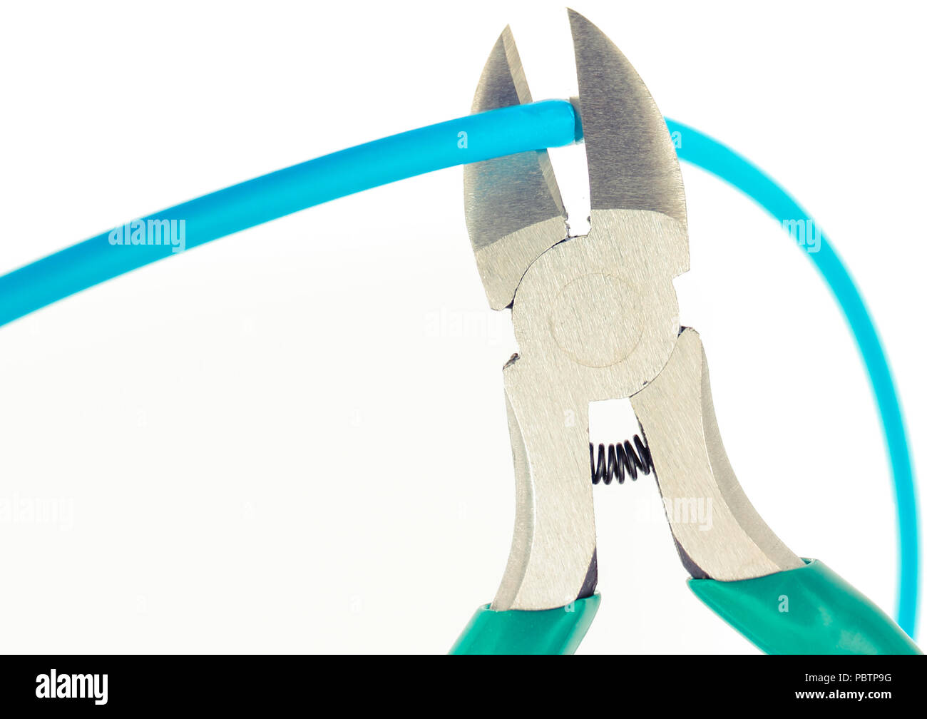 Closeup of metal nippers with blue cable for using in electrical ...