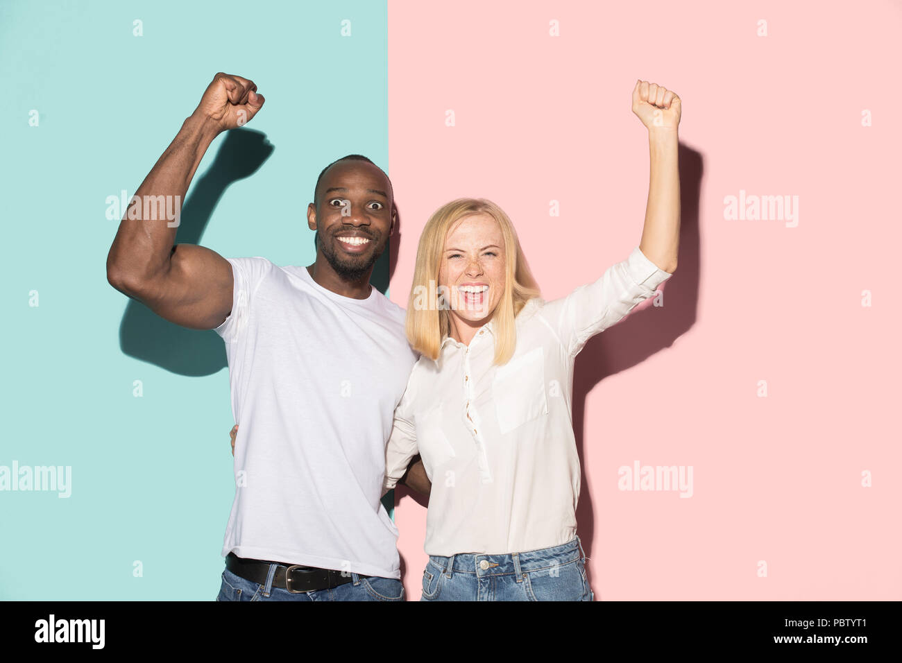 We won. Winning success happy afro man and woman celebrating being a ...