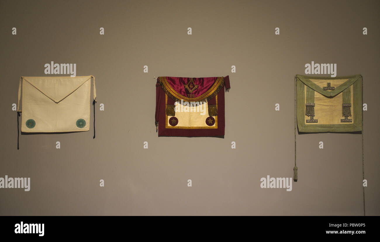 masonic cloths on white wall in museum Stock Photo - Alamy