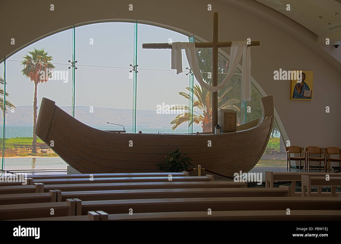 Magdala Chapel with boat and Sea of Galilee, Israel Stock Photo - Alamy