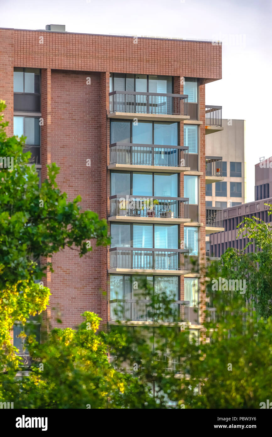 Residential high rise with trees Stock Photo - Alamy