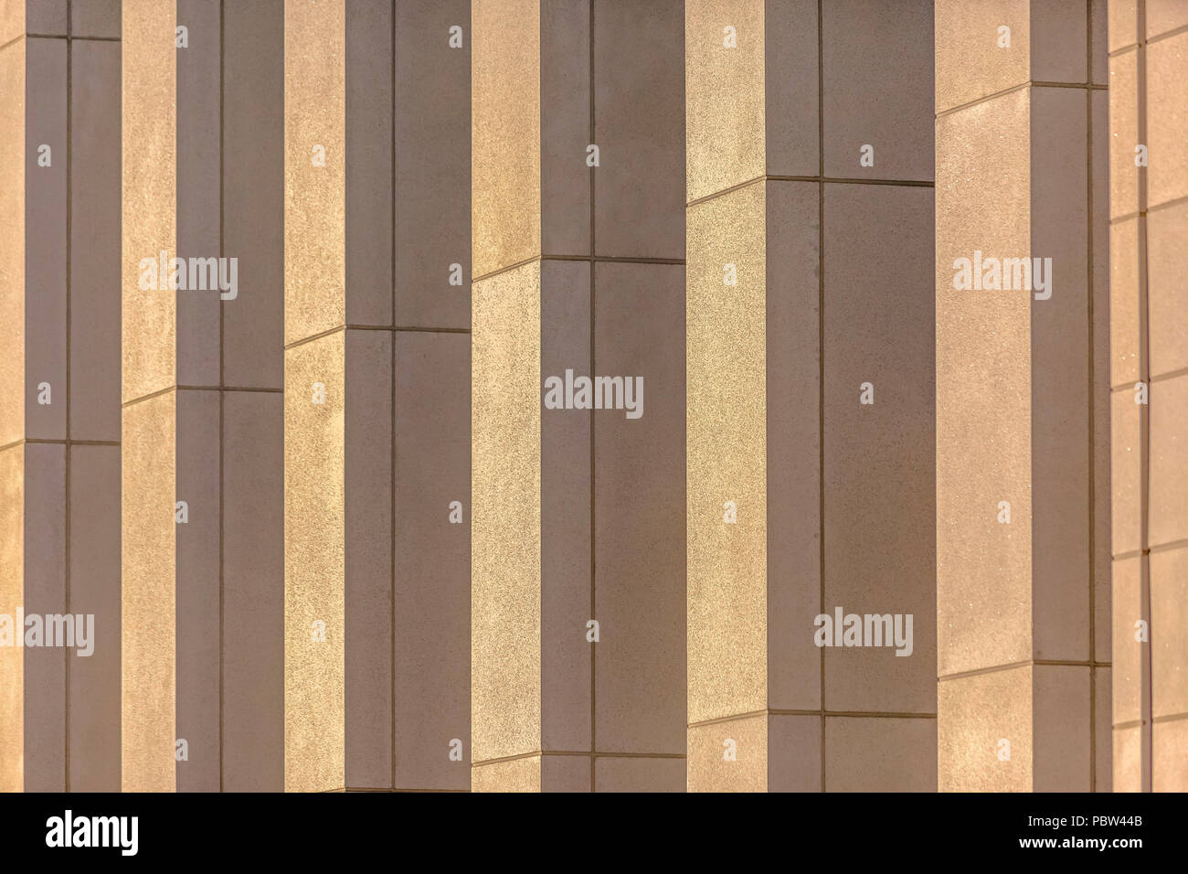 Tall stone columns of brutalist building Stock Photo - Alamy