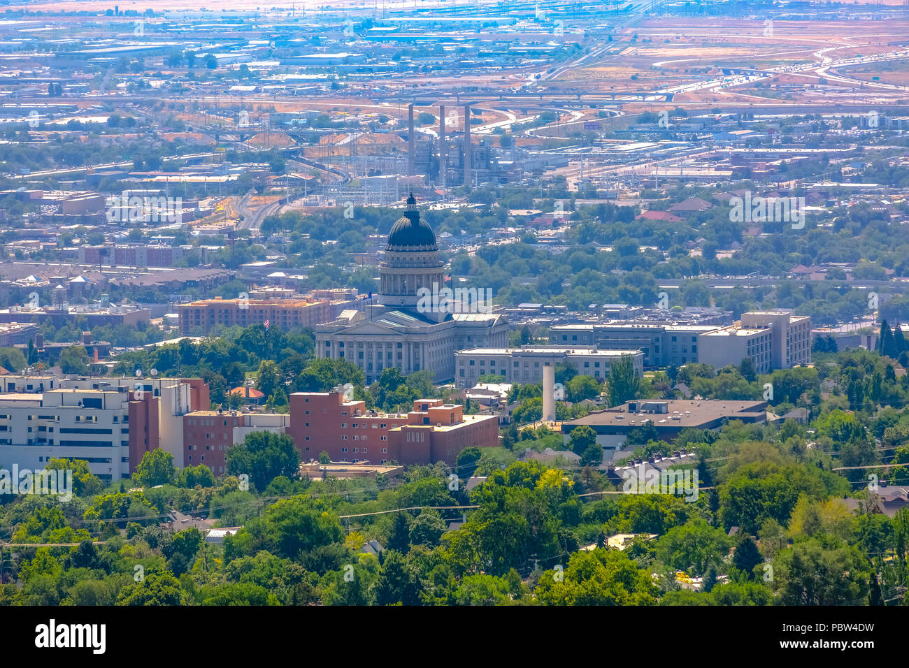 Utah State Capital building among the city Stock Photo - Alamy