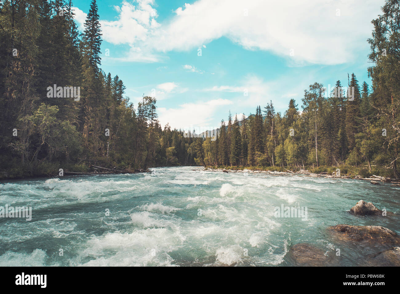 The fast flowing crystal clear waters of the River during early spring ...
