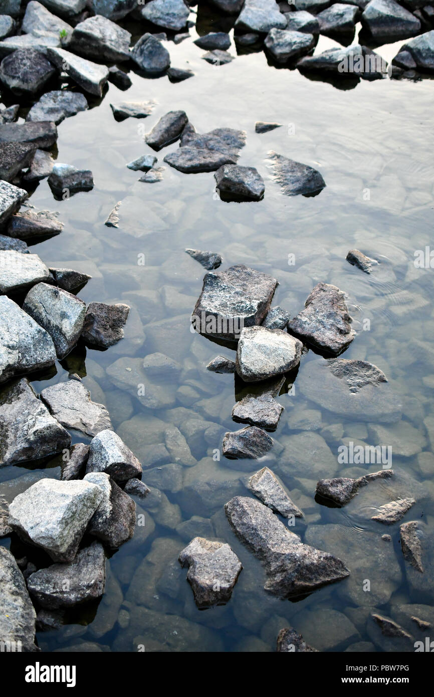 granite rock in water Stock Photo - Alamy