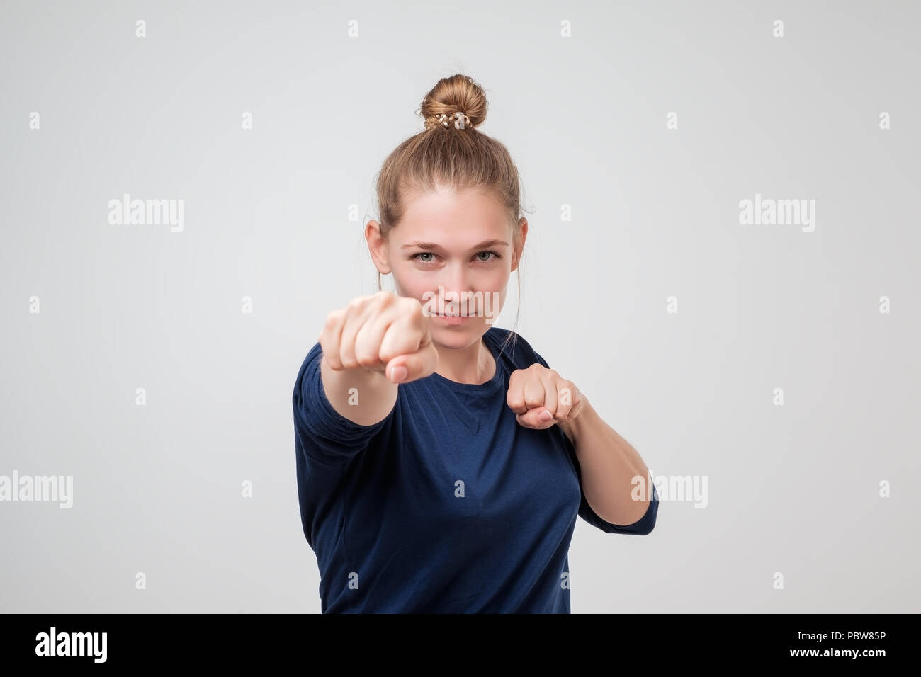 Anger woman fist hi-res stock photography and images - Alamy