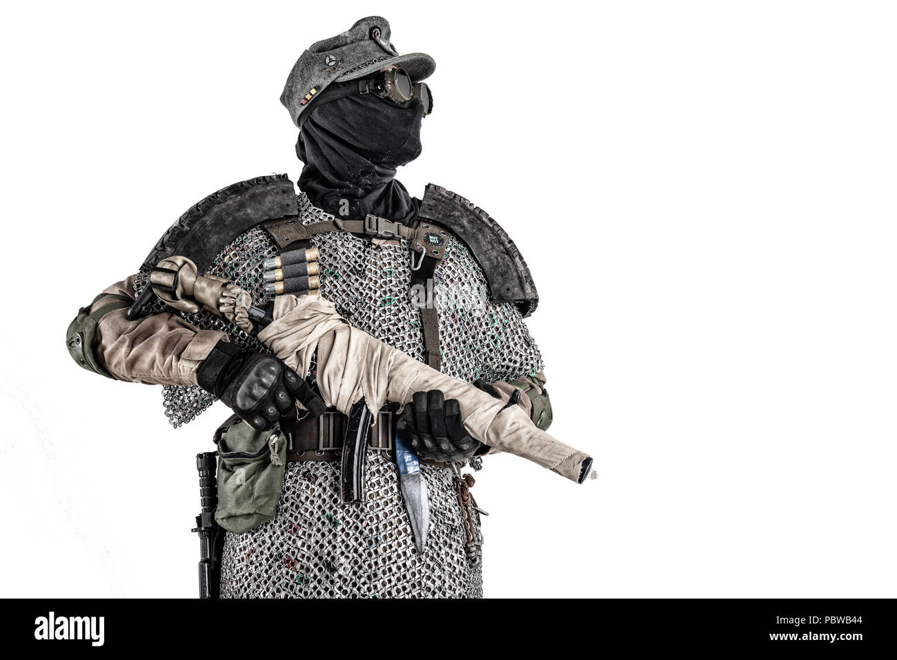 Post apocalyptic soldier aiming firearm weapon Stock Photo - Alamy