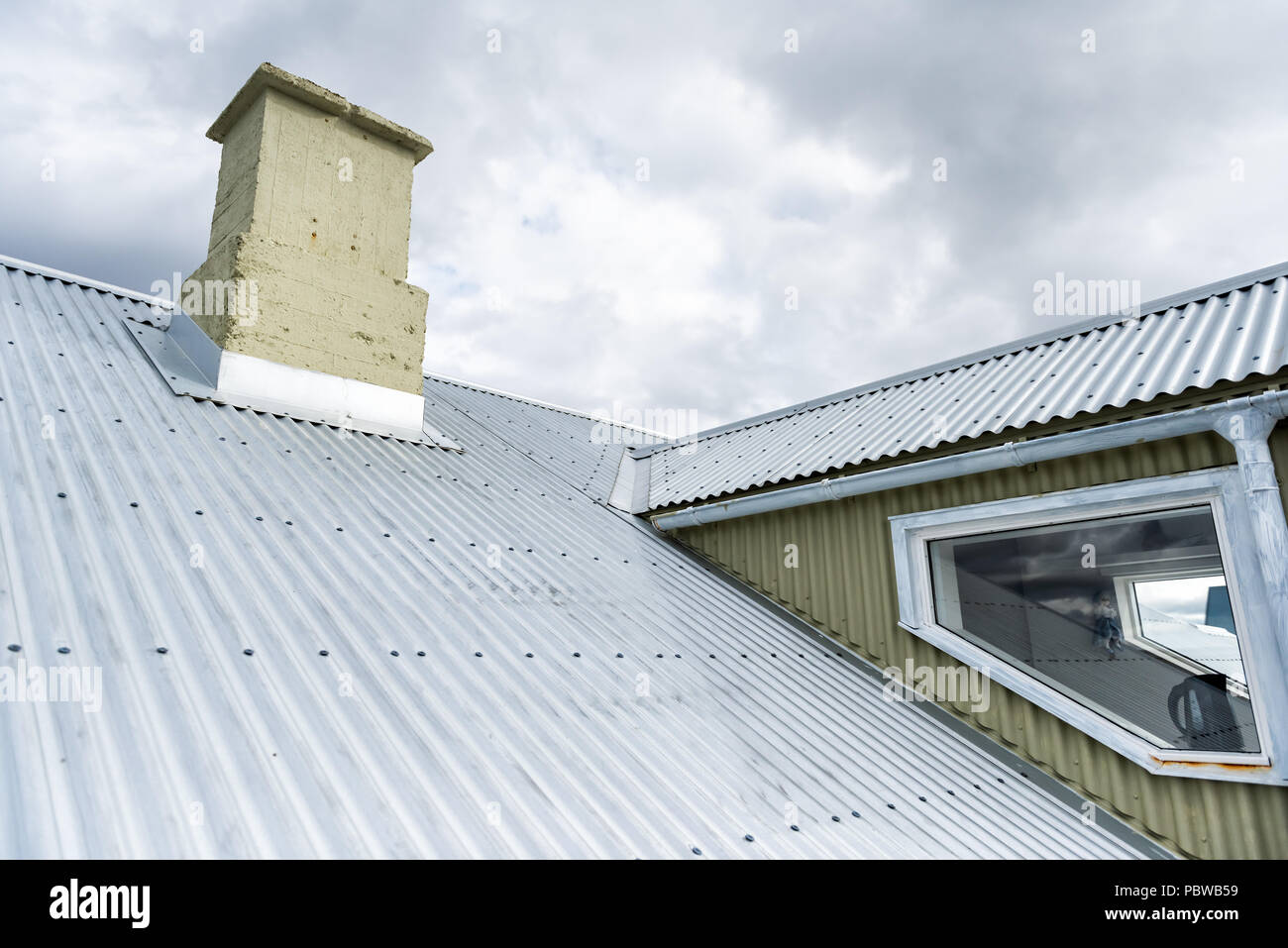 Closeup of rooftop roof chimney, window architecture in Stykkisholmur ...