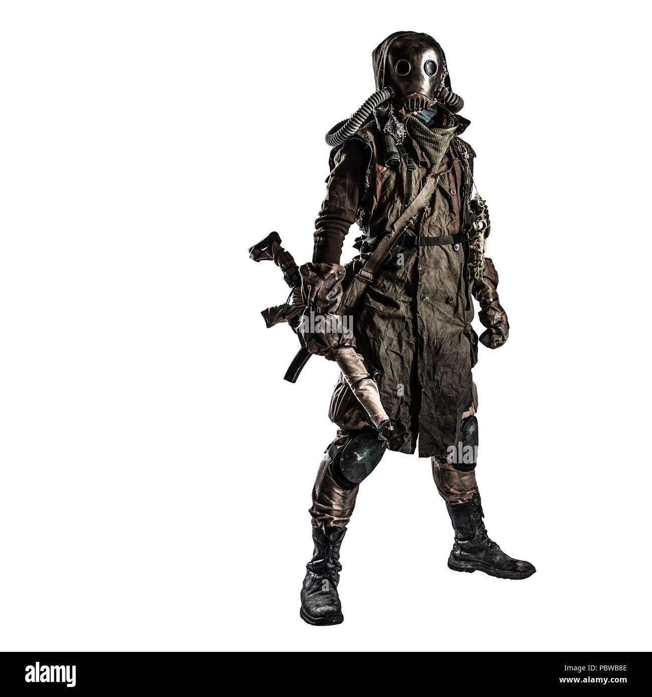 Post apocalyptic creature in gas mask armed by gun Stock Photo - Alamy