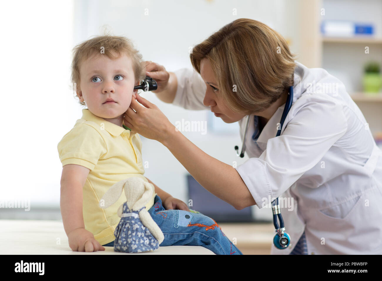 Doctor stethoscope in ears looking hi-res stock photography and images ...