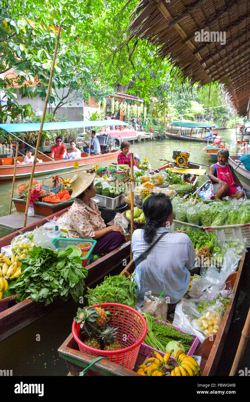 BANGKOK - JULY 29 : Farmer selling fruit vegetable and food on boats at ...