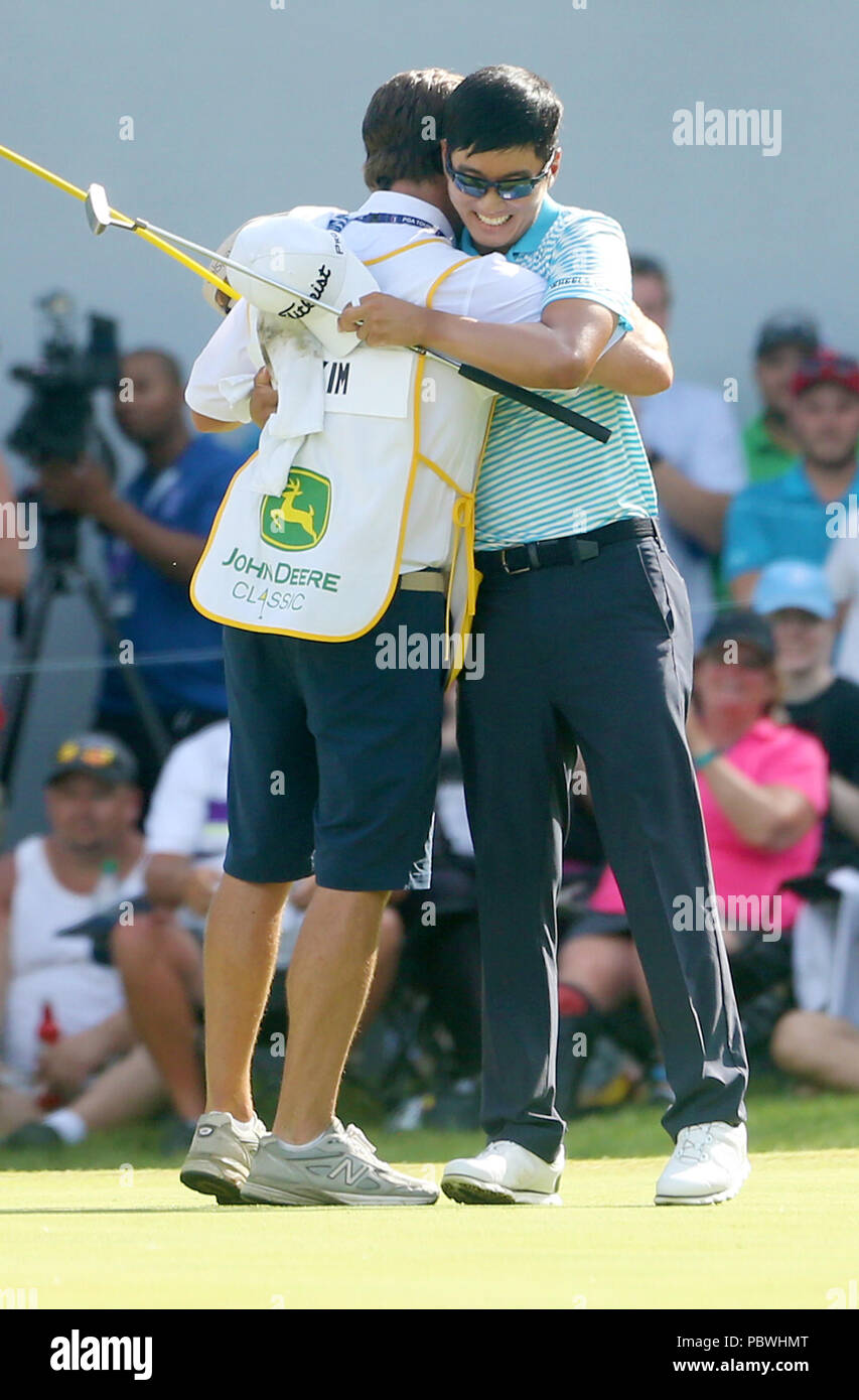 July 15, 2018 - Silvis, Iowa, U.S. - Winner Michael Kim hugs his caddy ...