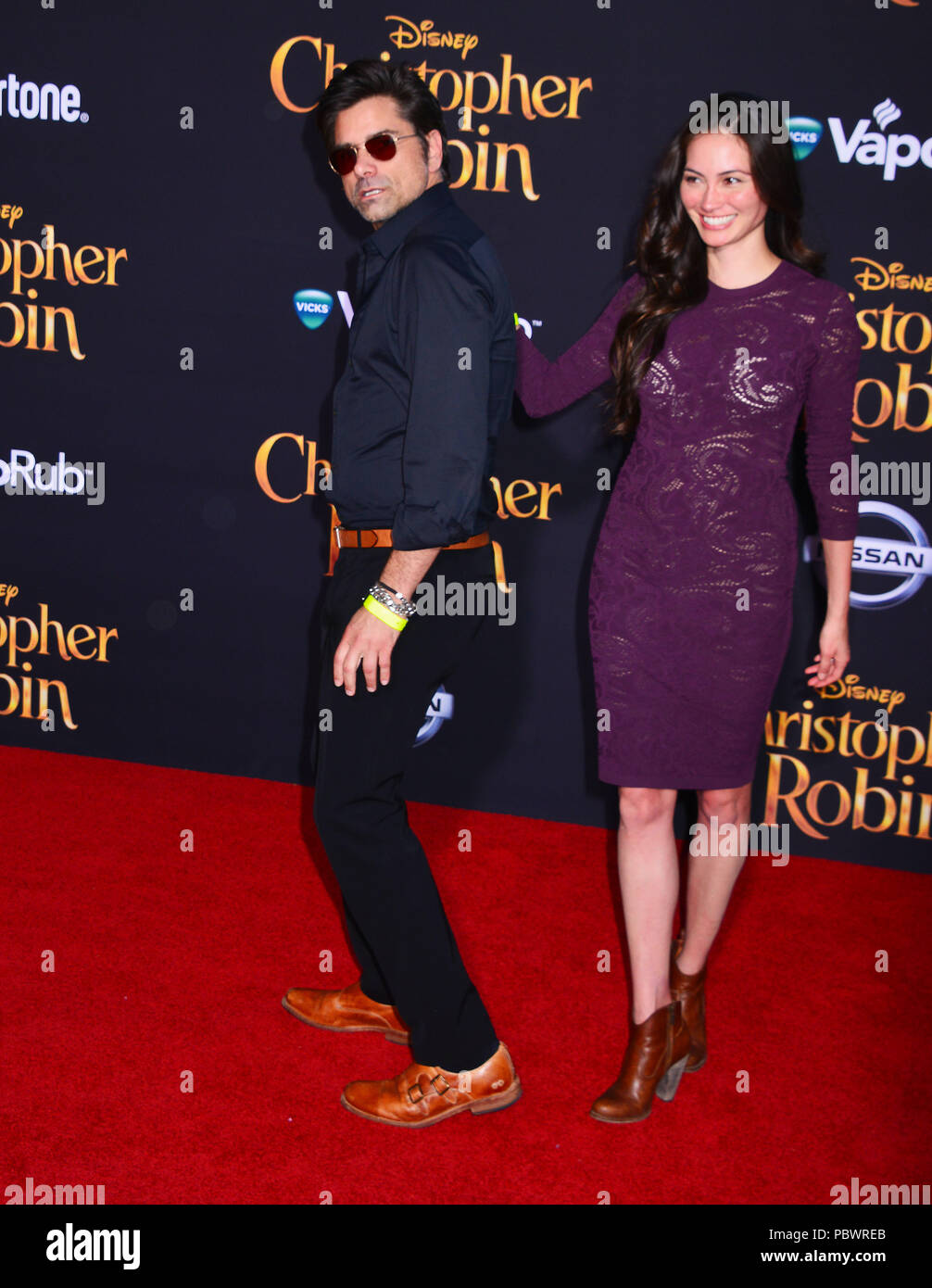 Burbank, California, USA. 30th July 2018. John Stamos, Caitlin McHugh ...