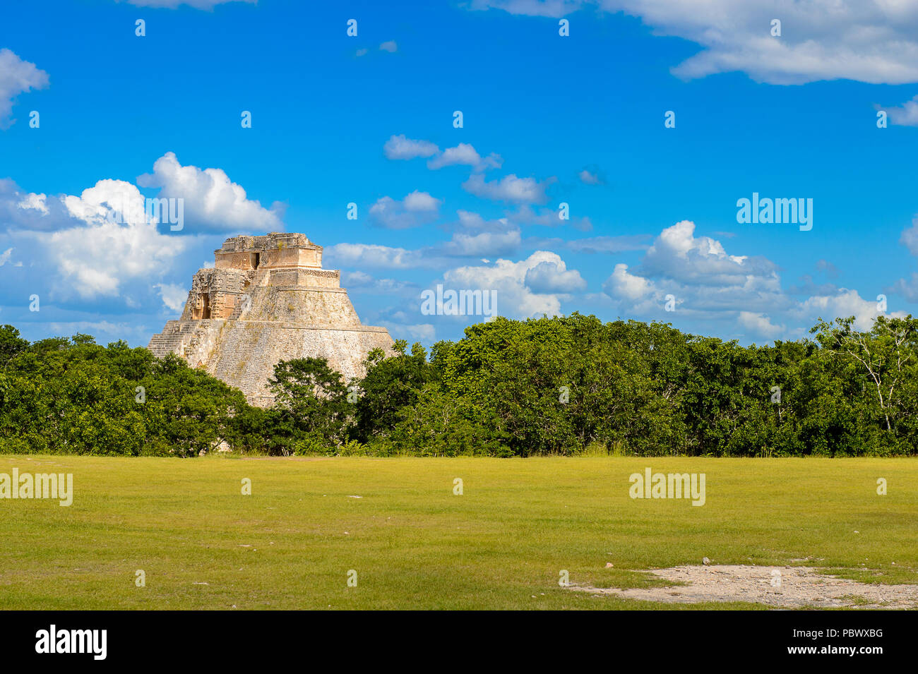 Pyramid of the Magician in the jungle, a Mesoamerican step pyramid ...