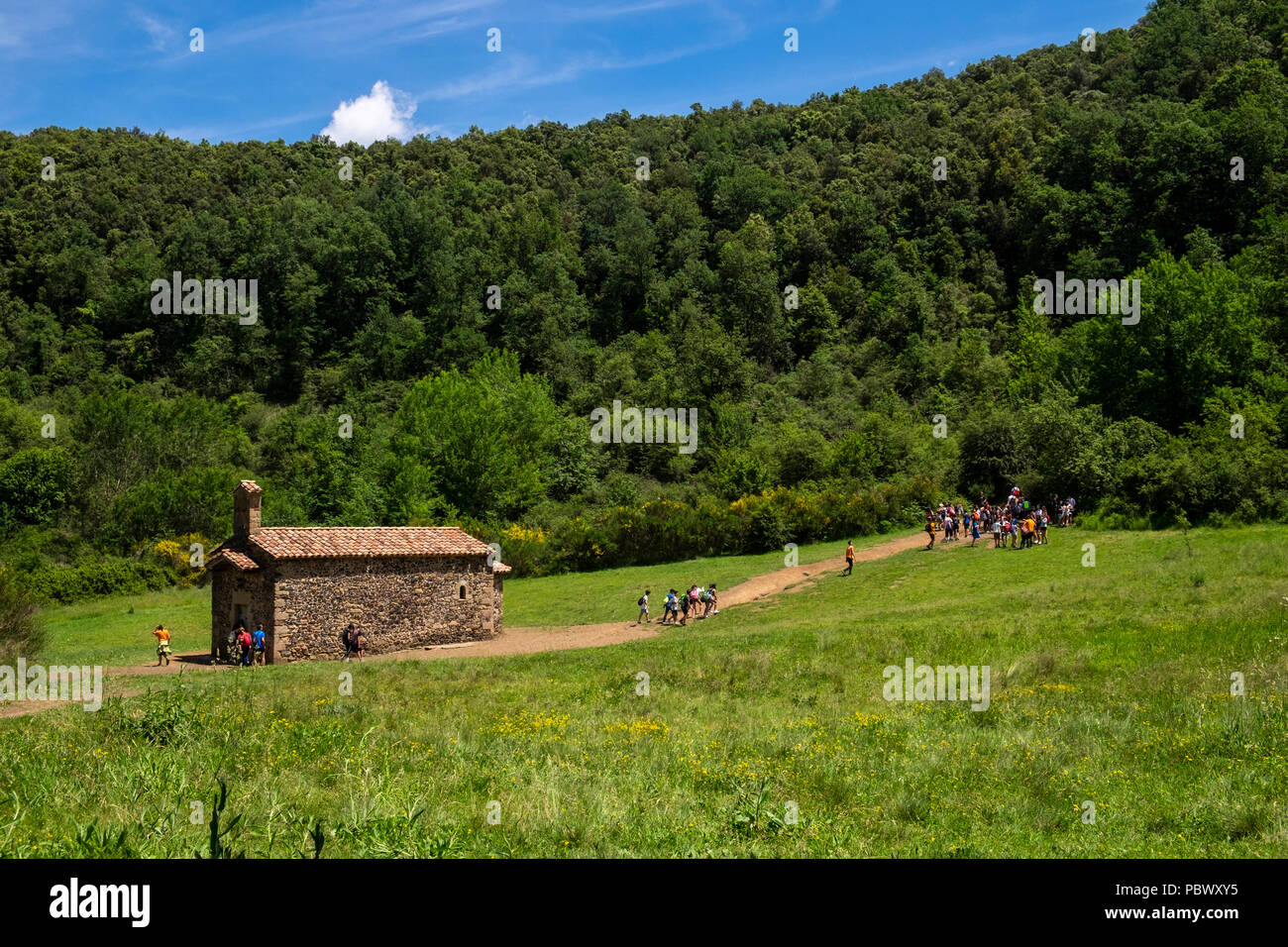 Crater and church building in the Santa Margarida volcano in summer ...