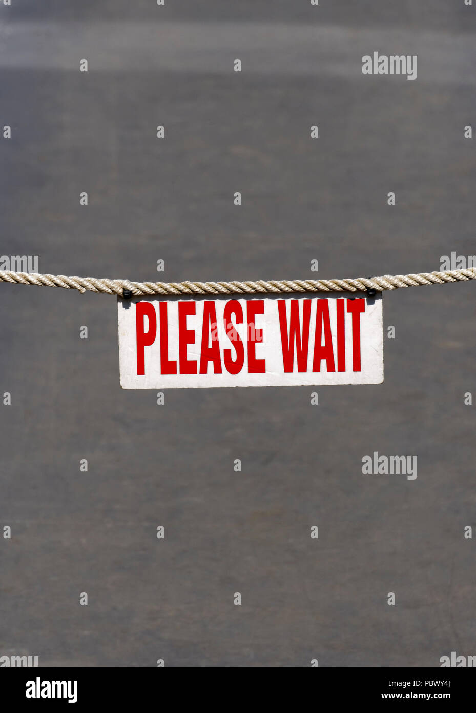 Please wait hi-res stock photography and images - Alamy