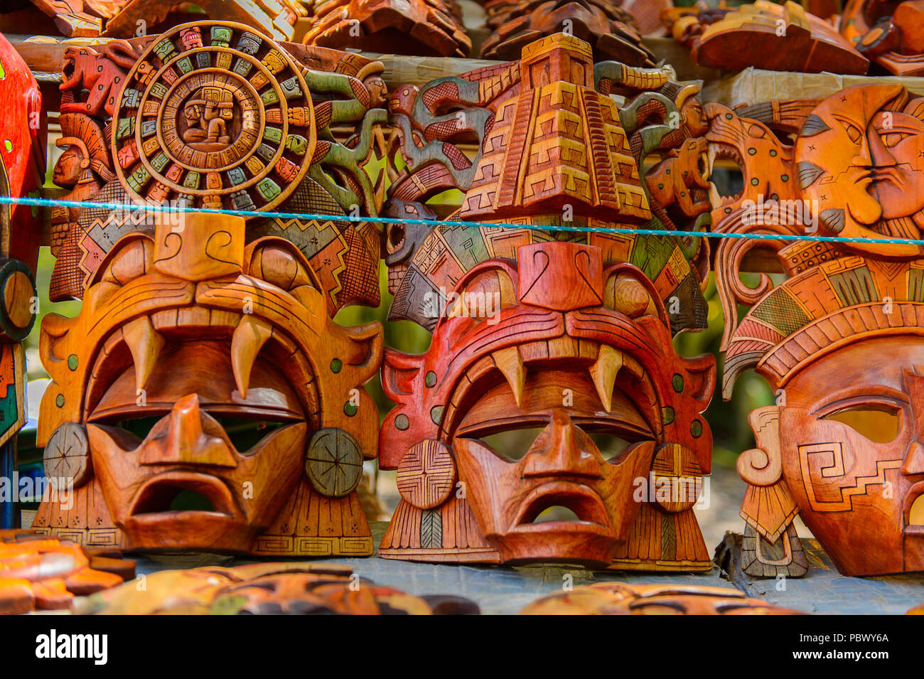 Masks, Authentic handcraft souvenirs of maya civilisation Stock Photo ...