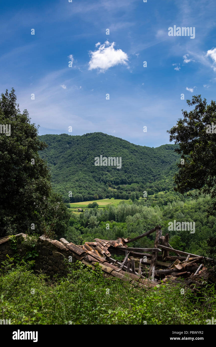 Collapsed roof on an old farmhouse in the Garrotxa volcanic zone in ...