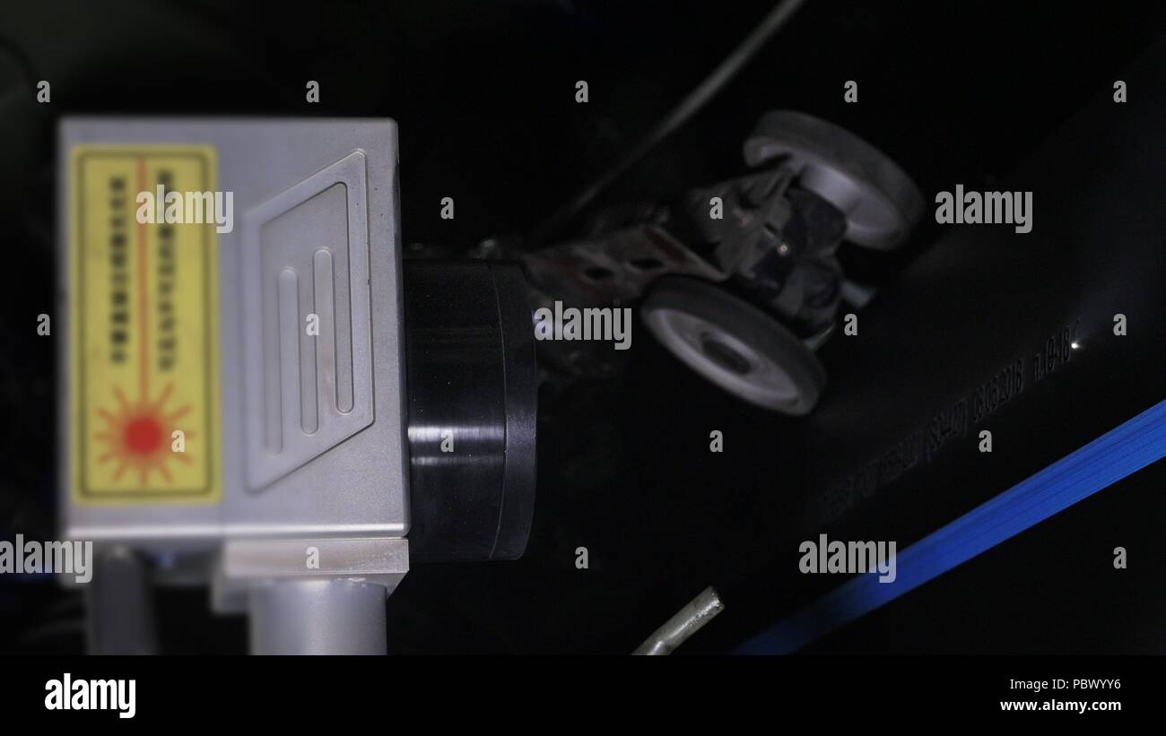 Laser Marking Machine Engraving. Manufacture of plastic water pipes ...