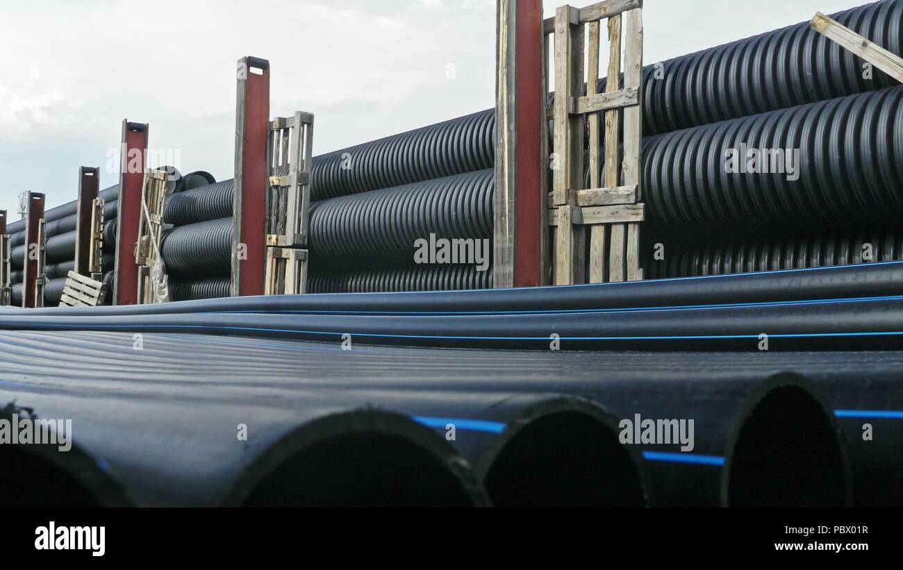 Warehouse of finished plastic pipes industrial outdoors storage site ...