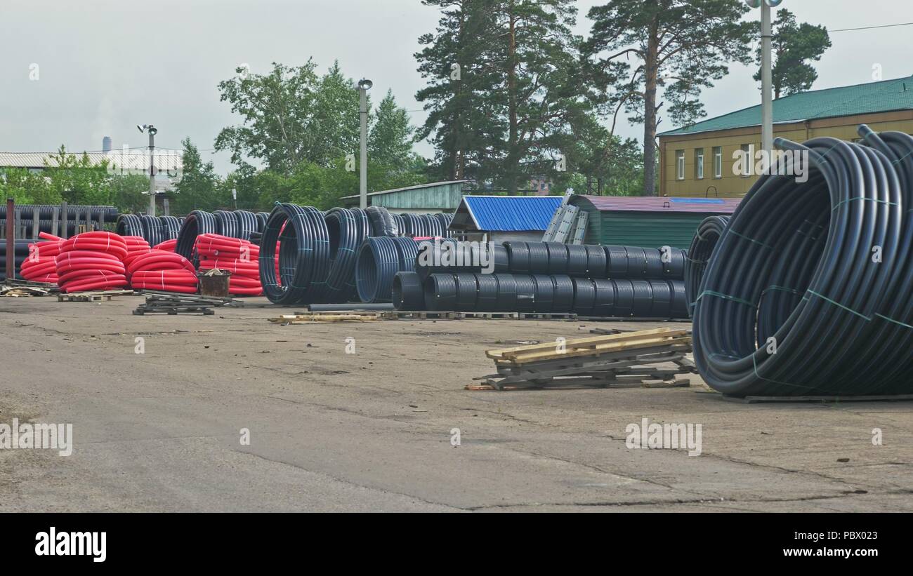 Warehouse of finished plastic pipes industrial outdoors storage site ...
