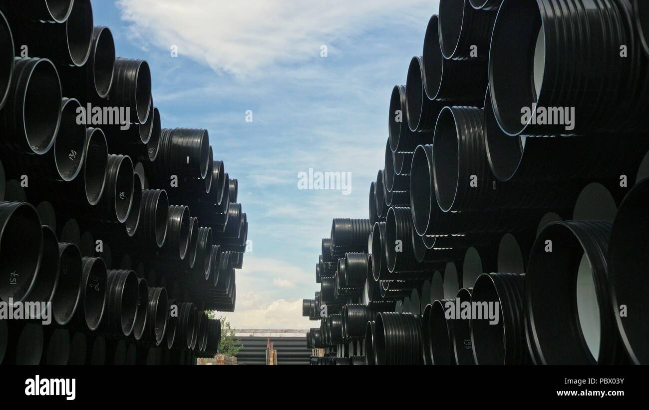 Warehouse of finished plastic pipes industrial outdoors storage site ...