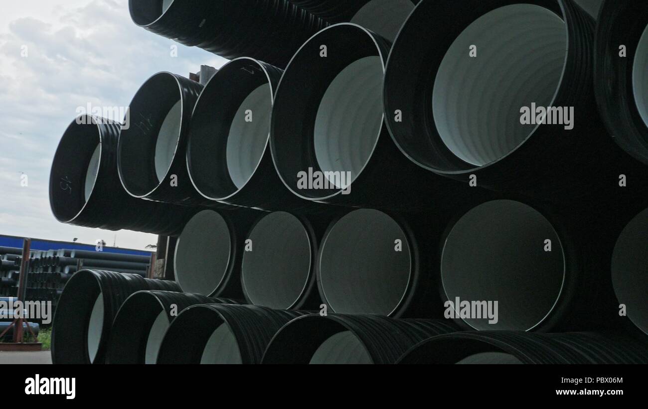 Warehouse of finished plastic pipes industrial outdoors storage site ...