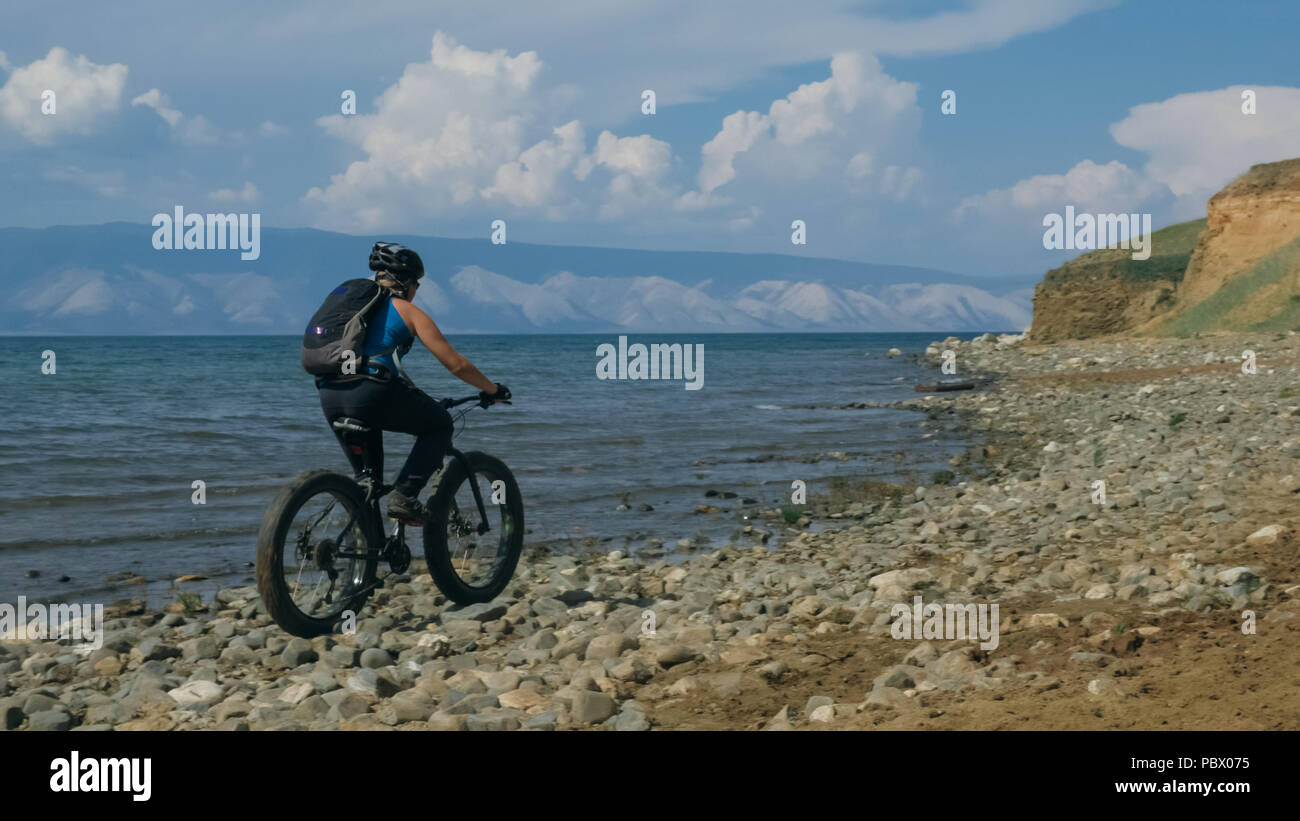 Fat bike also called fatbike or fat-tire bike in summer driving on the ...