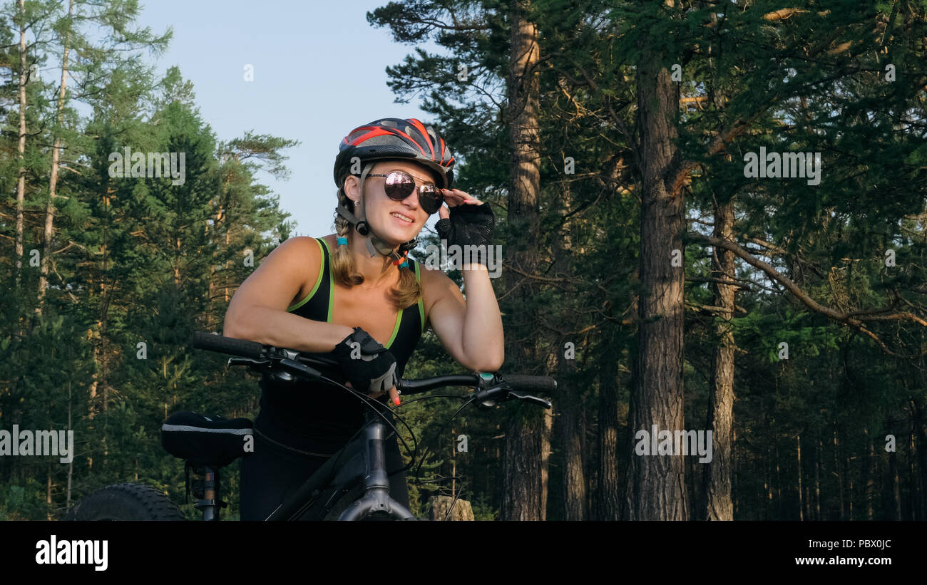 Fat bike also called fatbike or fat-tire bike in summer riding in the ...