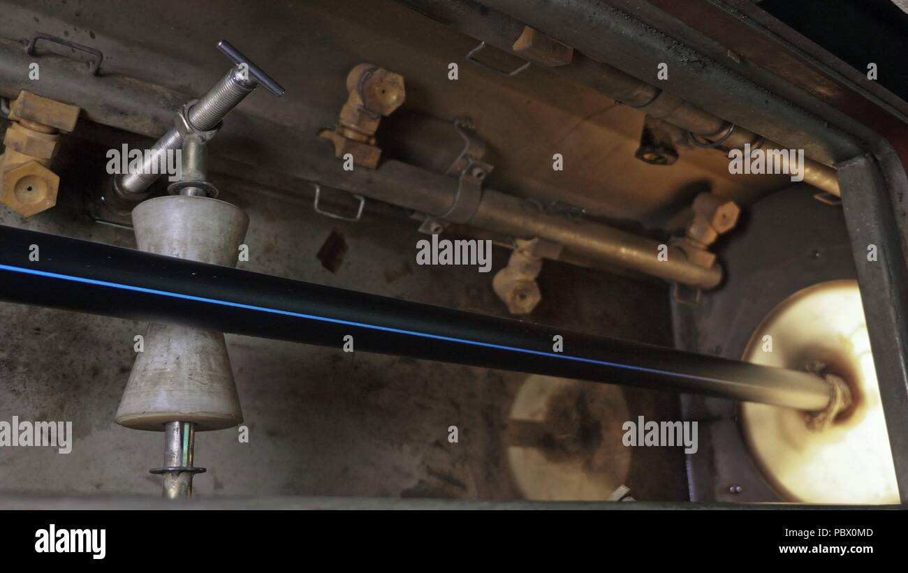 Pipes manufacturing production line. Manufacture of plastic water pipes ...