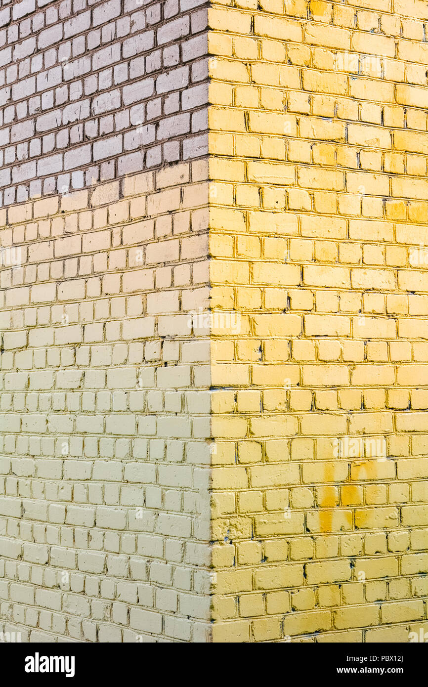 Yellow and gray stone bricks wall texture. Urban paintetd bricks as ...