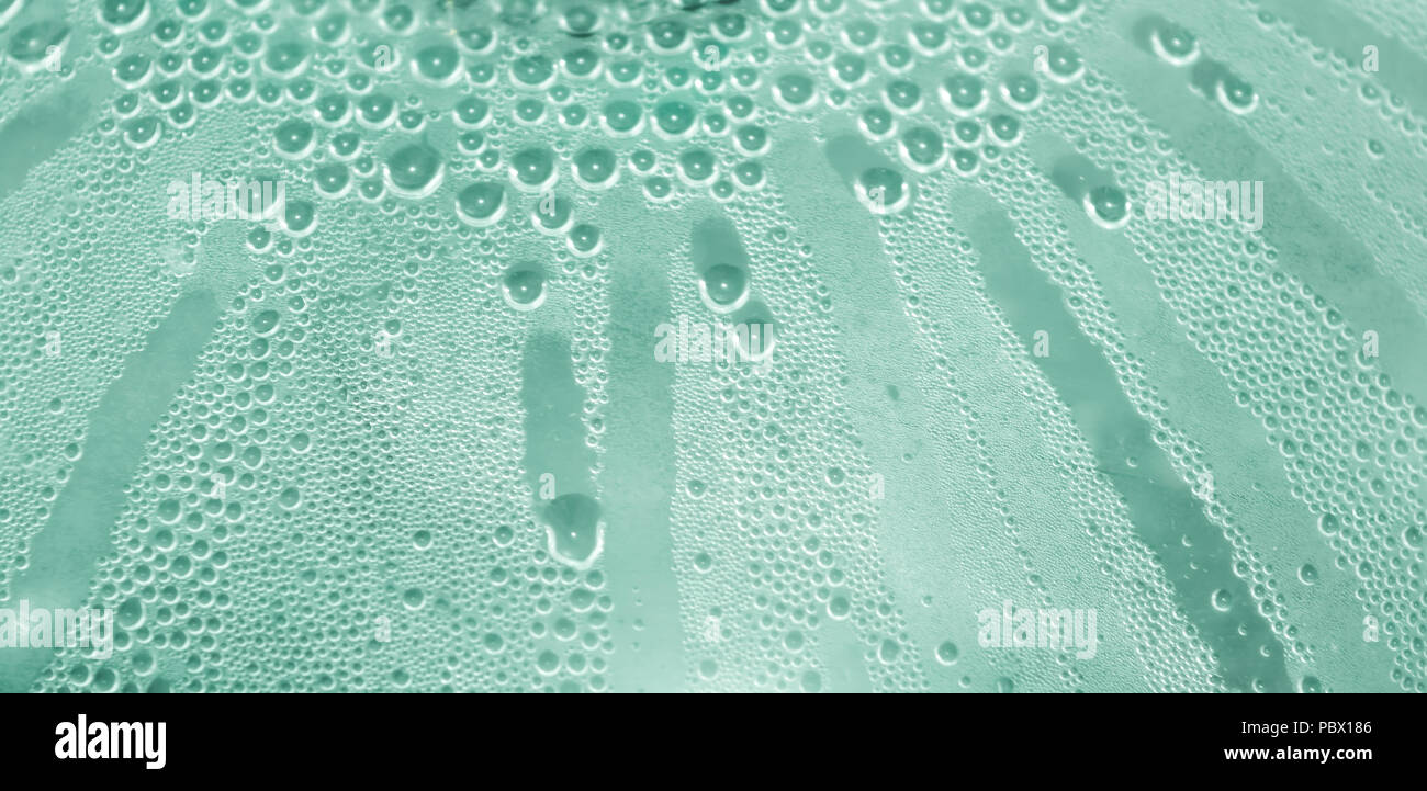 Water drops at gradient background. Glass covered with water drops ...