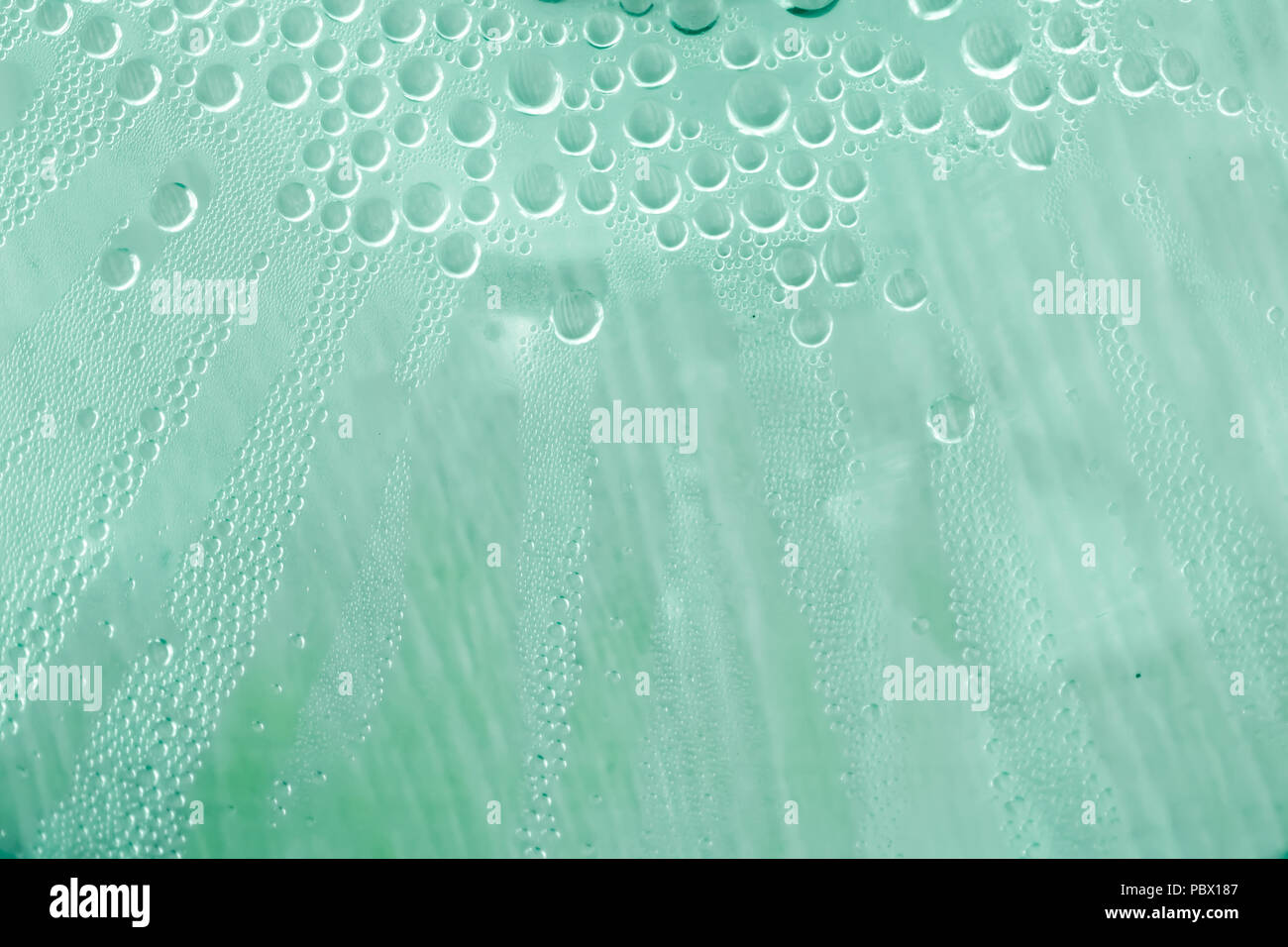 Water drops at gradient background. Glass covered with water drops ...