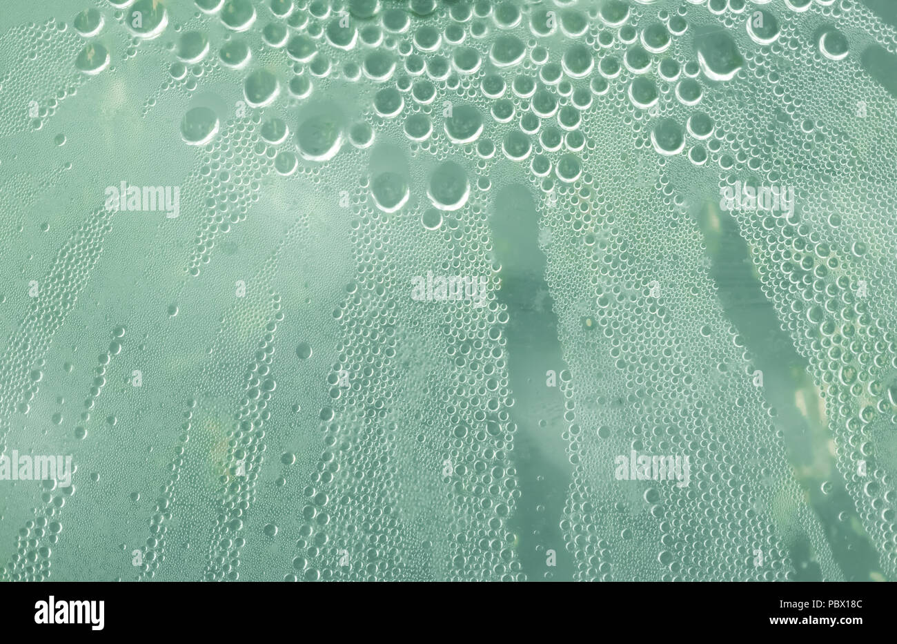 Water drops at gradient background. Glass covered with water drops ...