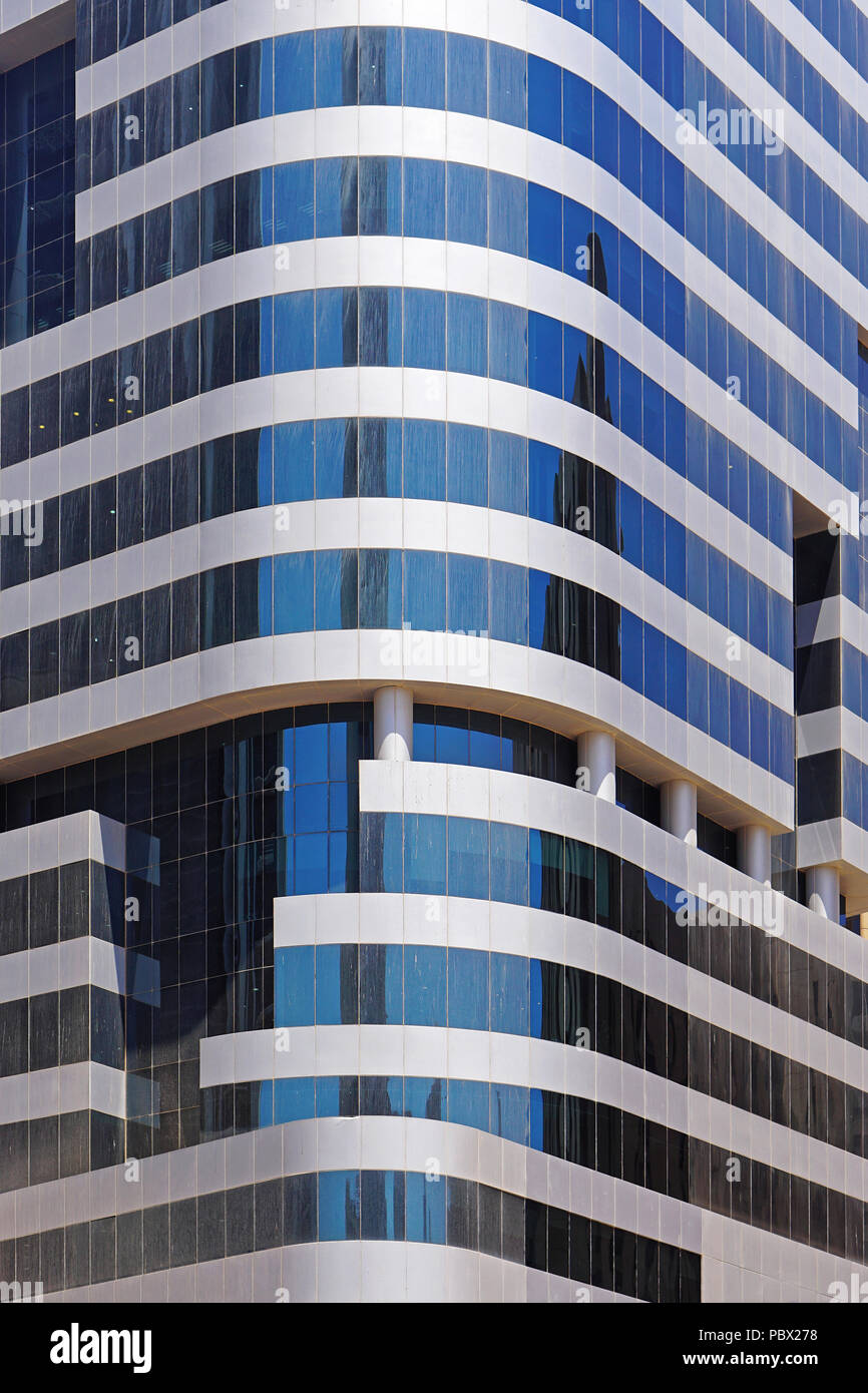 Modern glass skyscraper corner in Kuwait Stock Photo - Alamy
