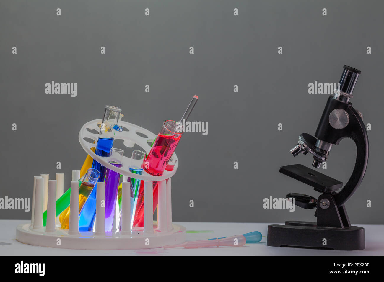 Experimental chemical flask in falling shelves. chemical liquid in the ...