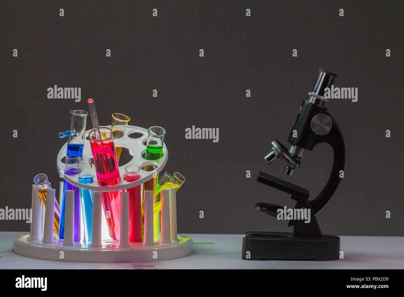 Experimental chemical flask in falling shelves. chemical liquid in the ...
