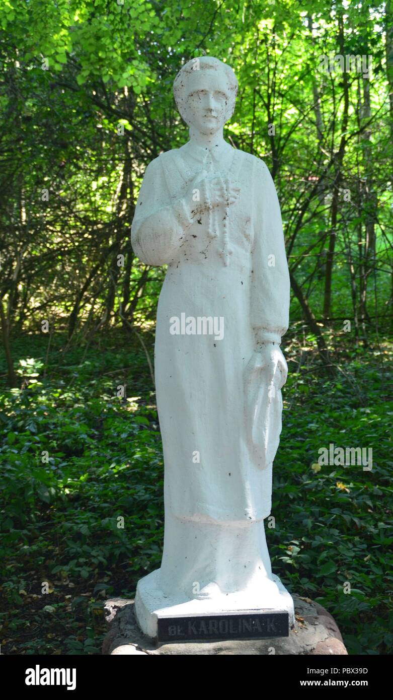 Urzedow, Poland - July 30, 2018: Stoned statues of saints in the shrine ...