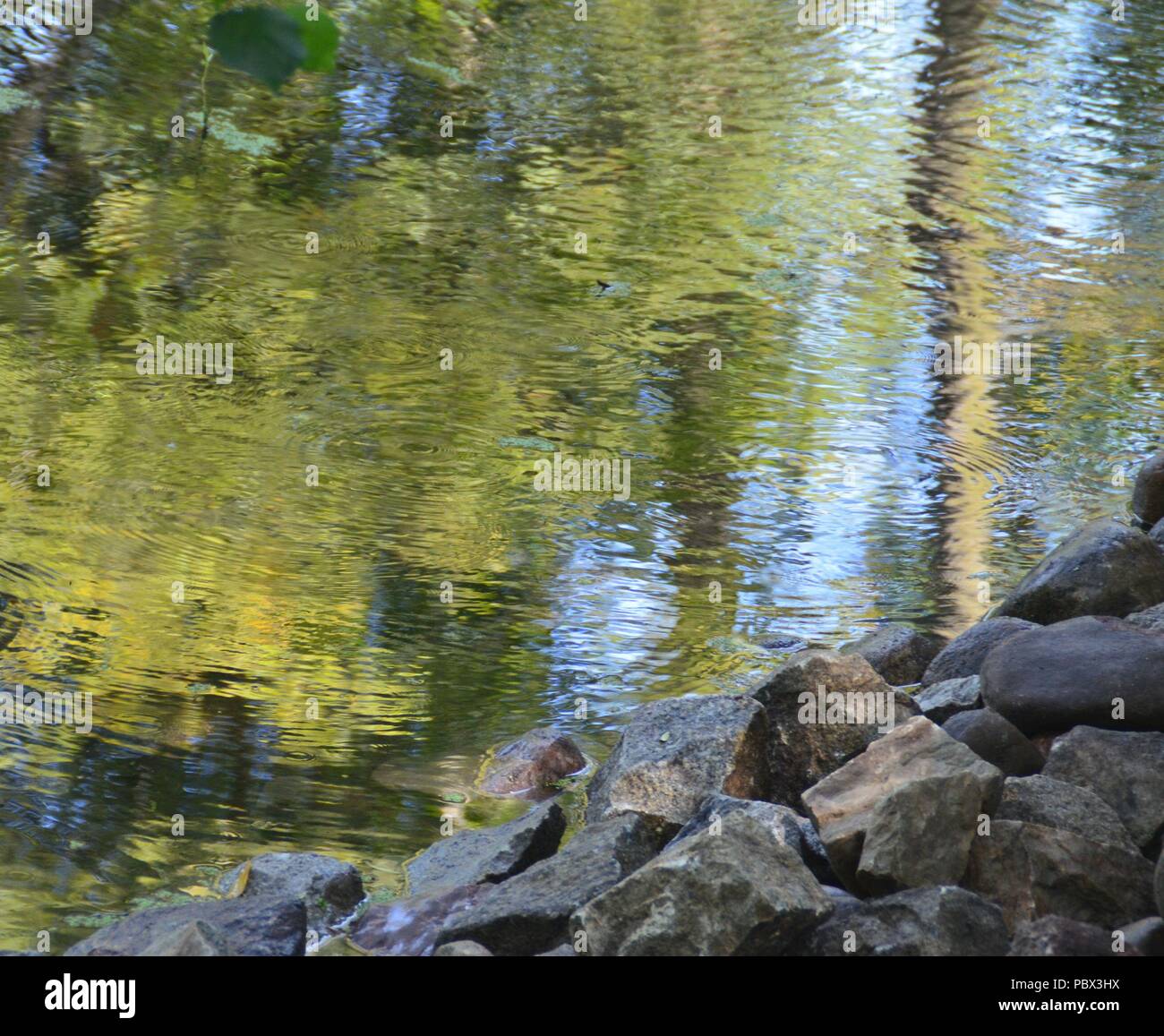 Crystal water and rocks Stock Photo - Alamy