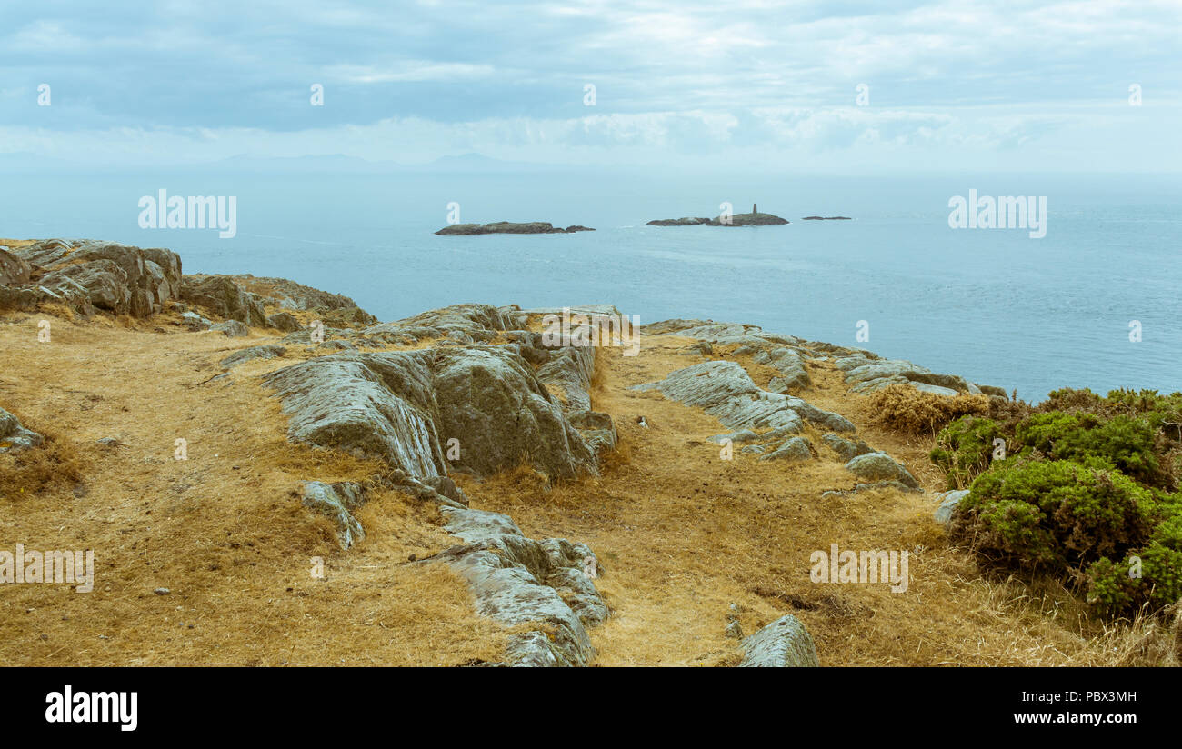 A view from around Rhoscolyn head on the Isle of Anglesey towards small ...