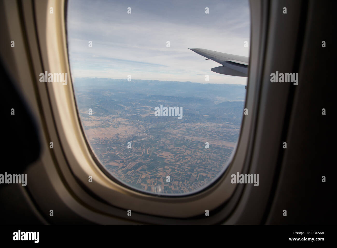 Close up Airplane window with airplane wing ,Traveling concept Stock ...