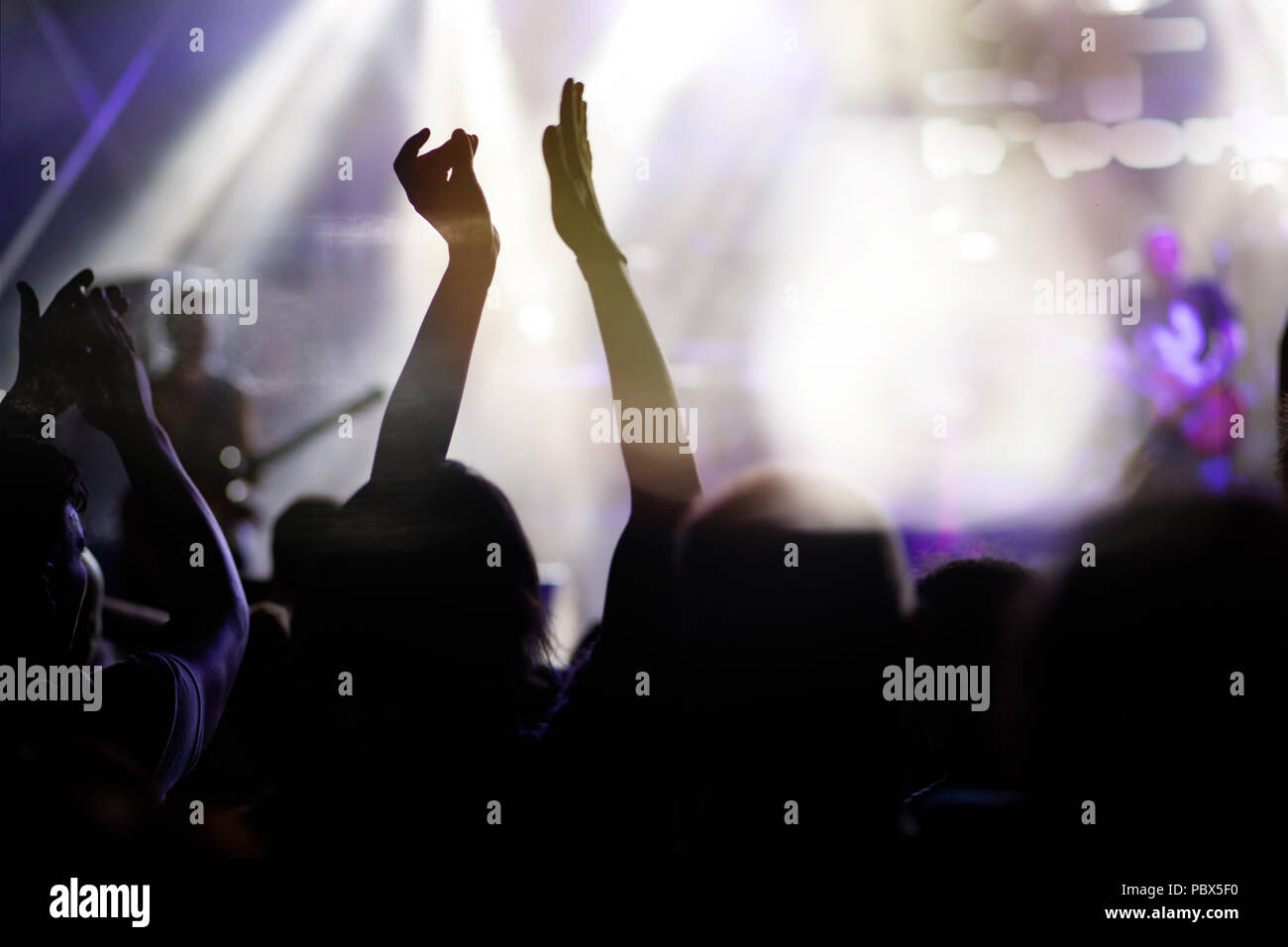 crowd with raised hands at concert - summer music festival Stock Photo ...