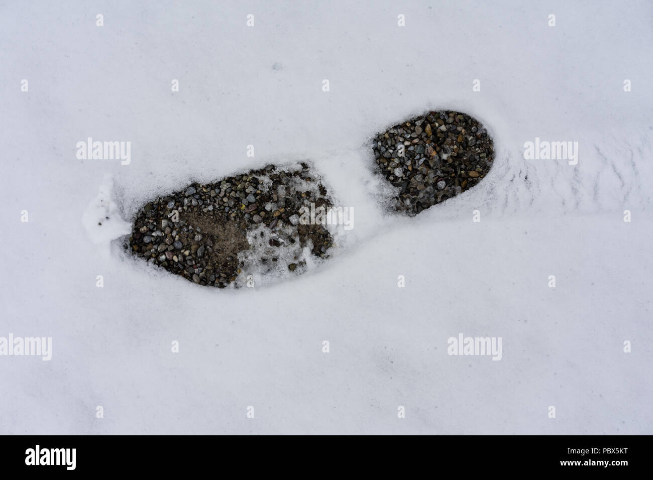 single footstep in snow outdoor winter weather Stock Photo - Alamy