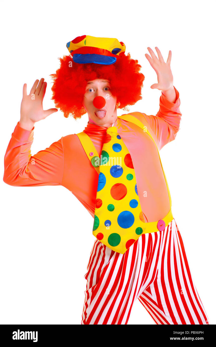 Happy young clown boy on white background Stock Photo - Alamy