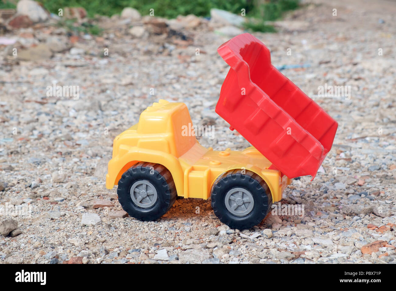 Plastic toy dumper truck hi-res stock photography and images - Alamy