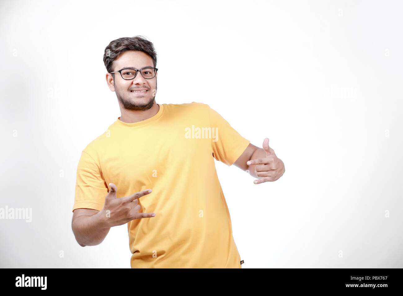 smart indian male model on spectacles Stock Photo - Alamy