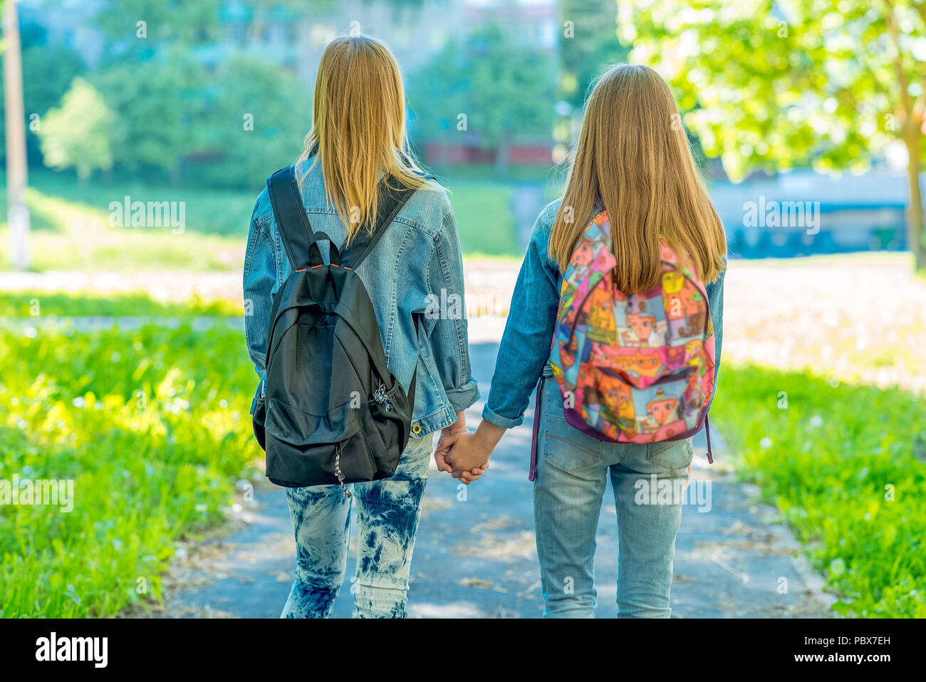 For a teenage girl. Summer nature. Returns home after school. They hold ...