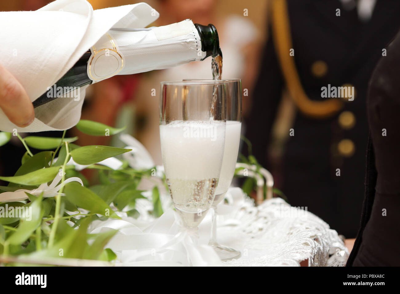 Champagne for bride and groom at wedding reception Stock Photo - Alamy