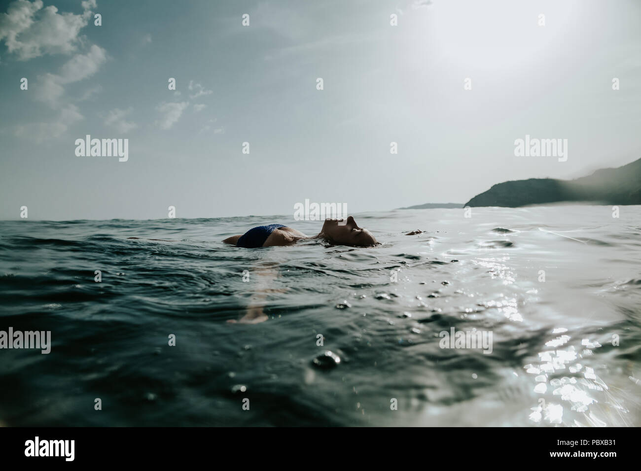 Fashion model floating in water hi-res stock photography and images - Alamy